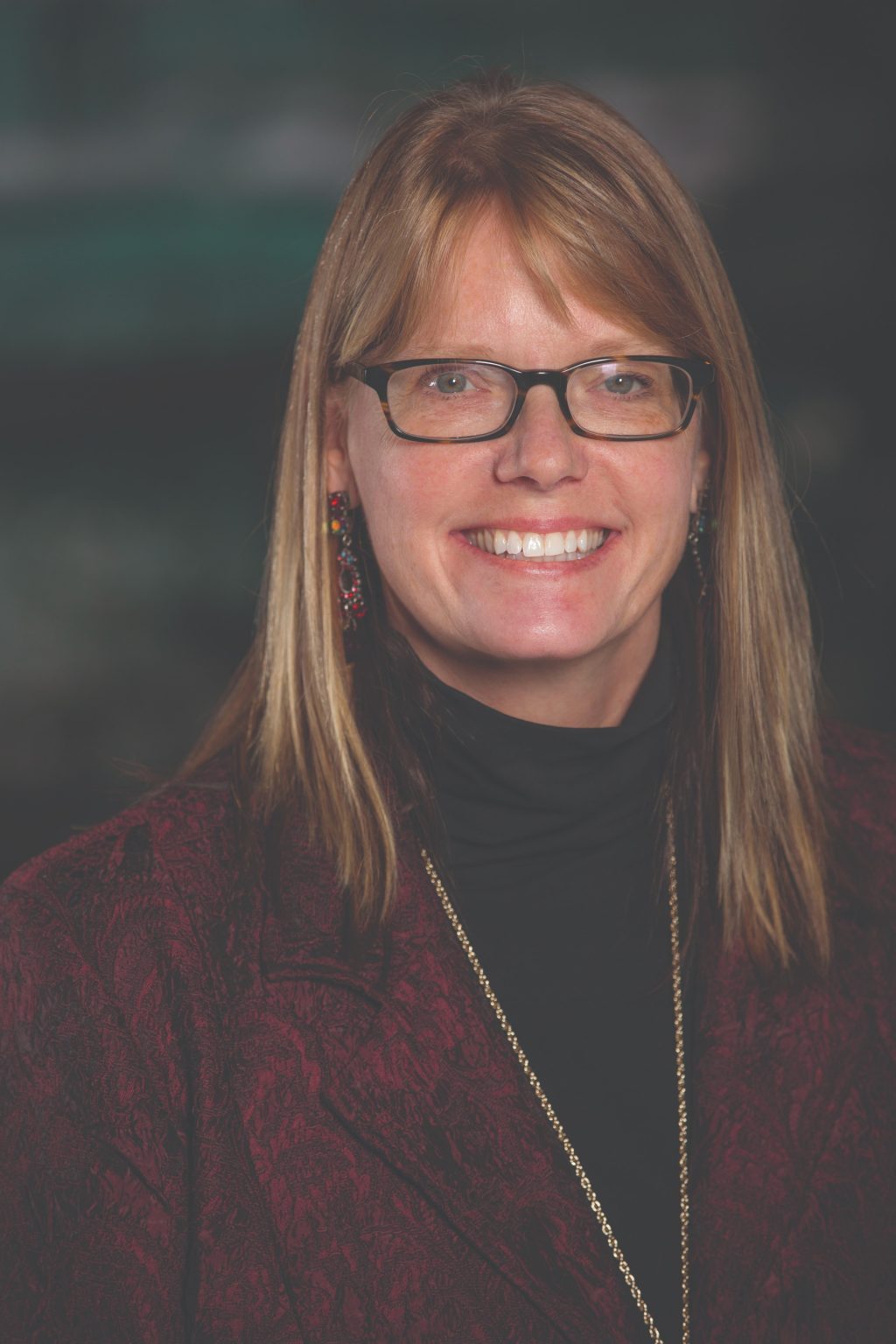 Suzanne Sweeney Steers IRT Ship Smoothly Over Stormy Seas